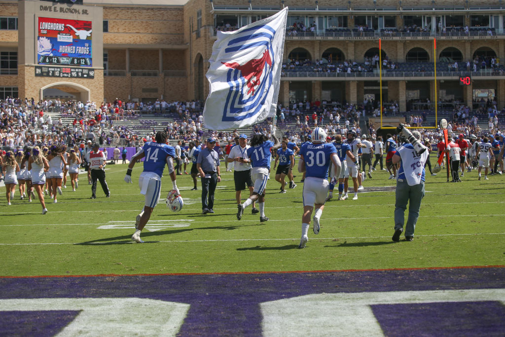 SMU Defeats TCU; Tries To Plant Flag On TCU Logo And Scuffle Ensues