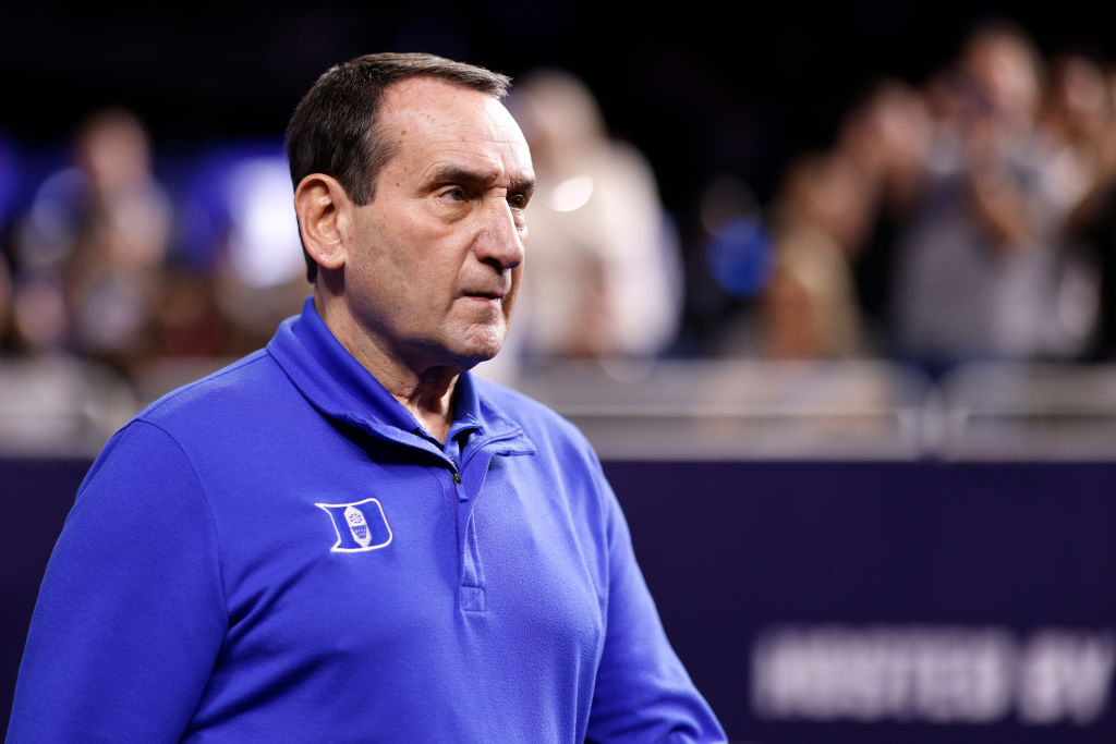 Coach K is Enjoying His Retirement by Feeding $100 Bills into a Slot ...