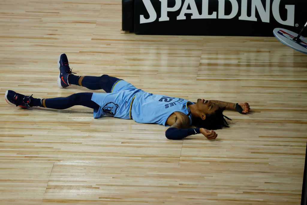 Ja Morant Exits Barclay's Center In A Wheelchair With A 'Lower Left Leg ...