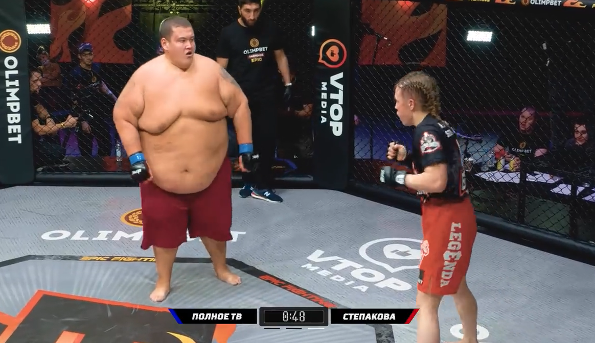 130-LB Woman Takes 530-LB Man The Distance In Wild Russian MMA Ma