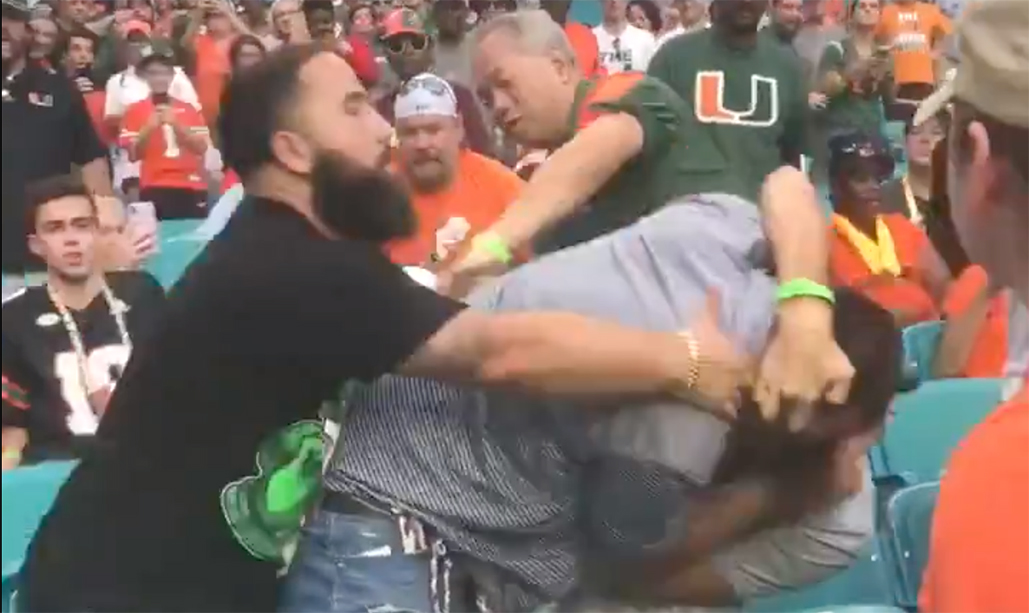 Miami Fans Brawl In Stands As Players Collide Into Themselves On Field ...