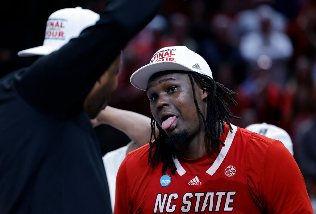 DJ Burns Celebrates With Arena Staff Members Following NC State's Win ...